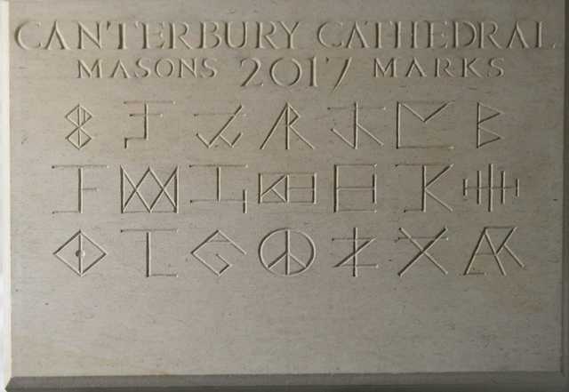 Stone showing the different stonemasons’ marks in Canterbury Cathedral